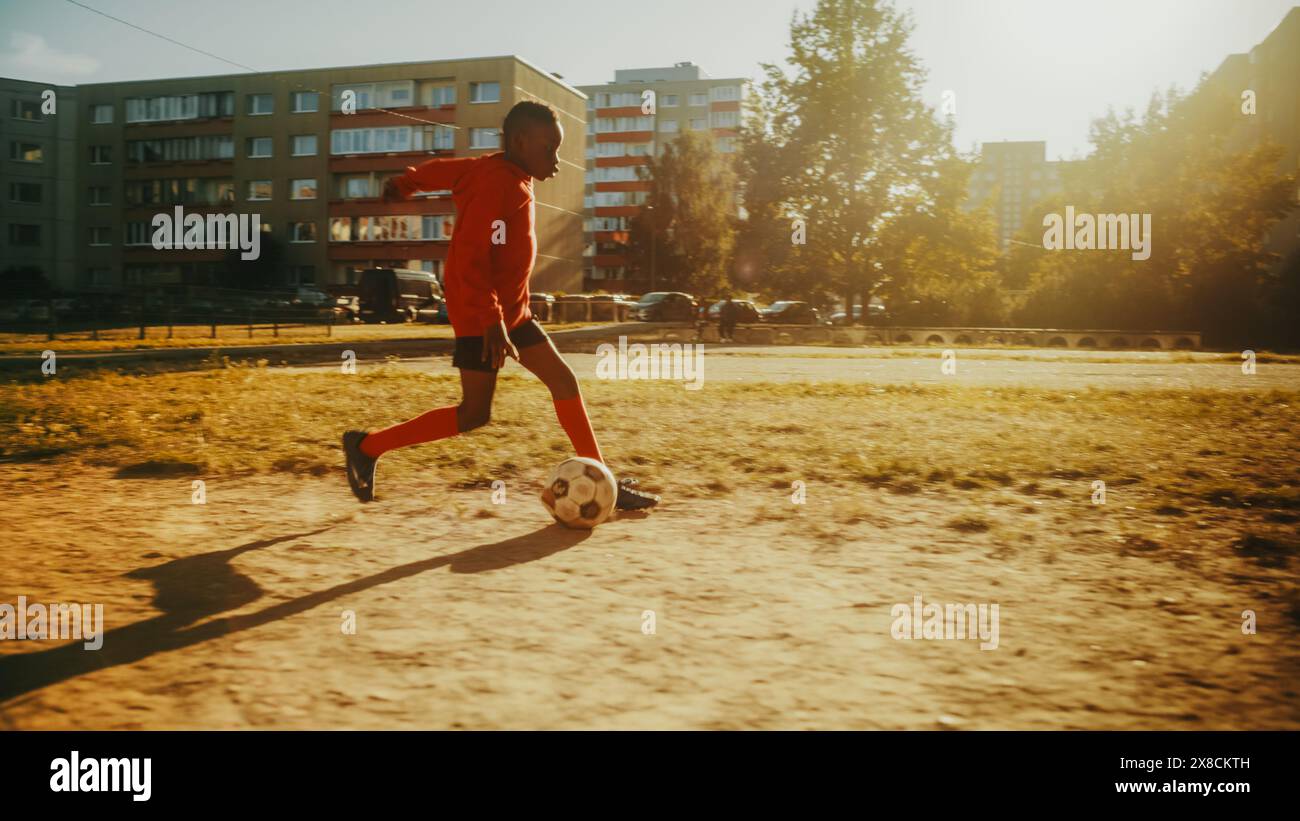 Young Talented Black Boy Practising Dribbling with Soccer Ball and ...