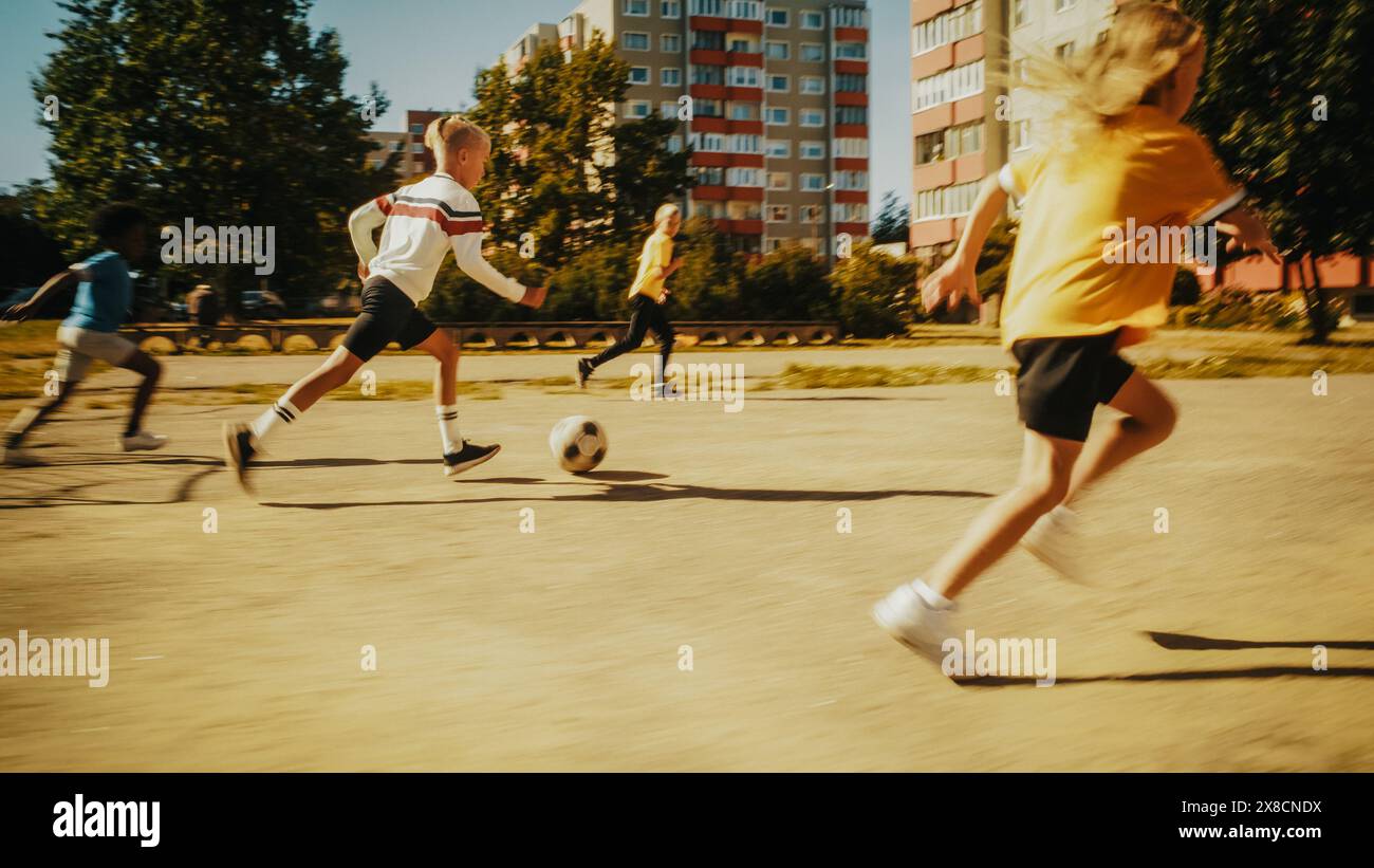 Multiethnic Diverse Friends Playing Soccer Outside in Urban Backyard ...