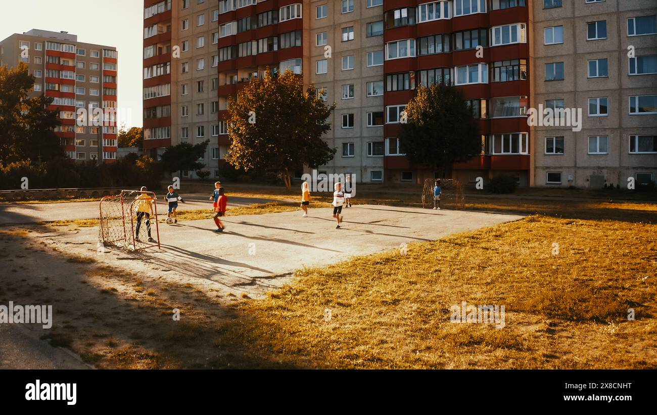 Aerial Drone Shot of Neighborhood Friends Playing Soccer Outside in ...