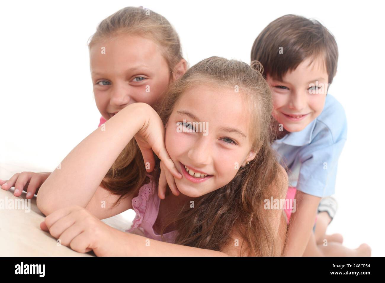 portrait of three cheerful kids on white background Stock Photo - Alamy