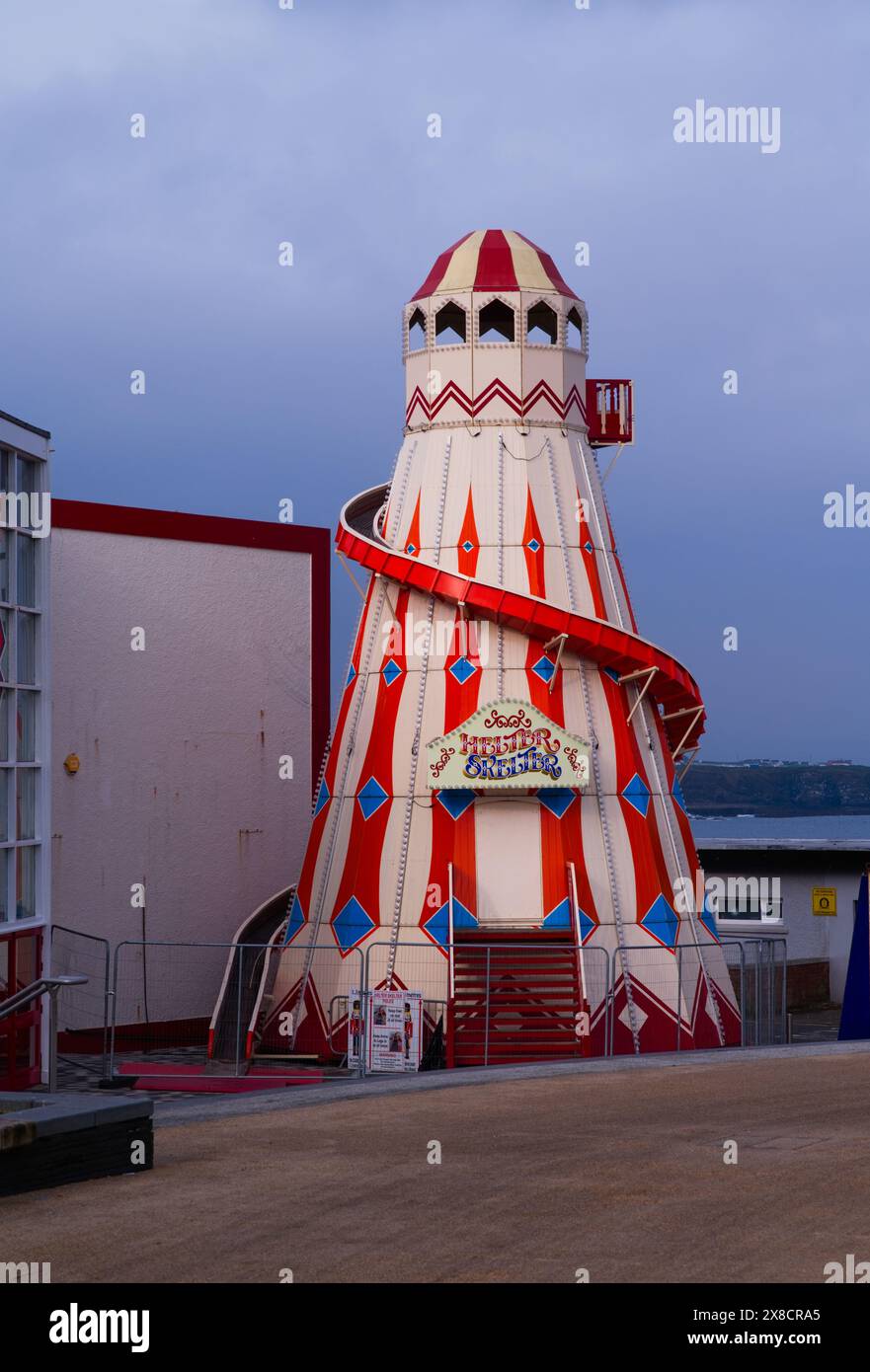 Tradional wooden helter skelter at Portrush fun fair in Northern ...