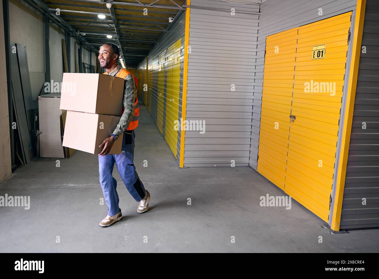 Male loader working in storage hi-res stock photography and images - Alamy