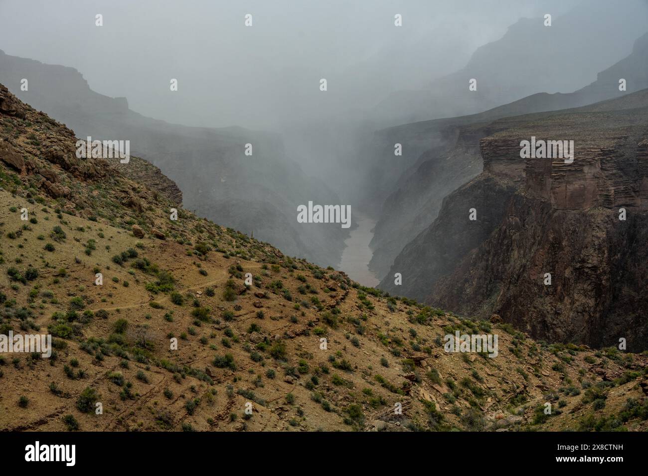 Tonto Trail Turns The Corner With Fog Hanging Low Over The Colorado ...