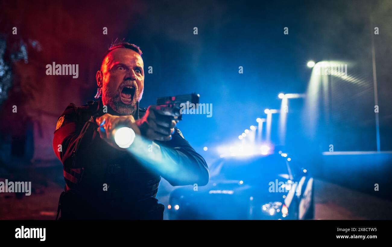 Portrait of White Male Police Officer Aiming Gun at Criminal, Orders to ...