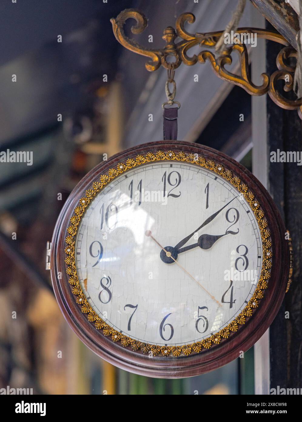 Large Analog Public Clock With White Dial and Big Numbers Hanging From ...