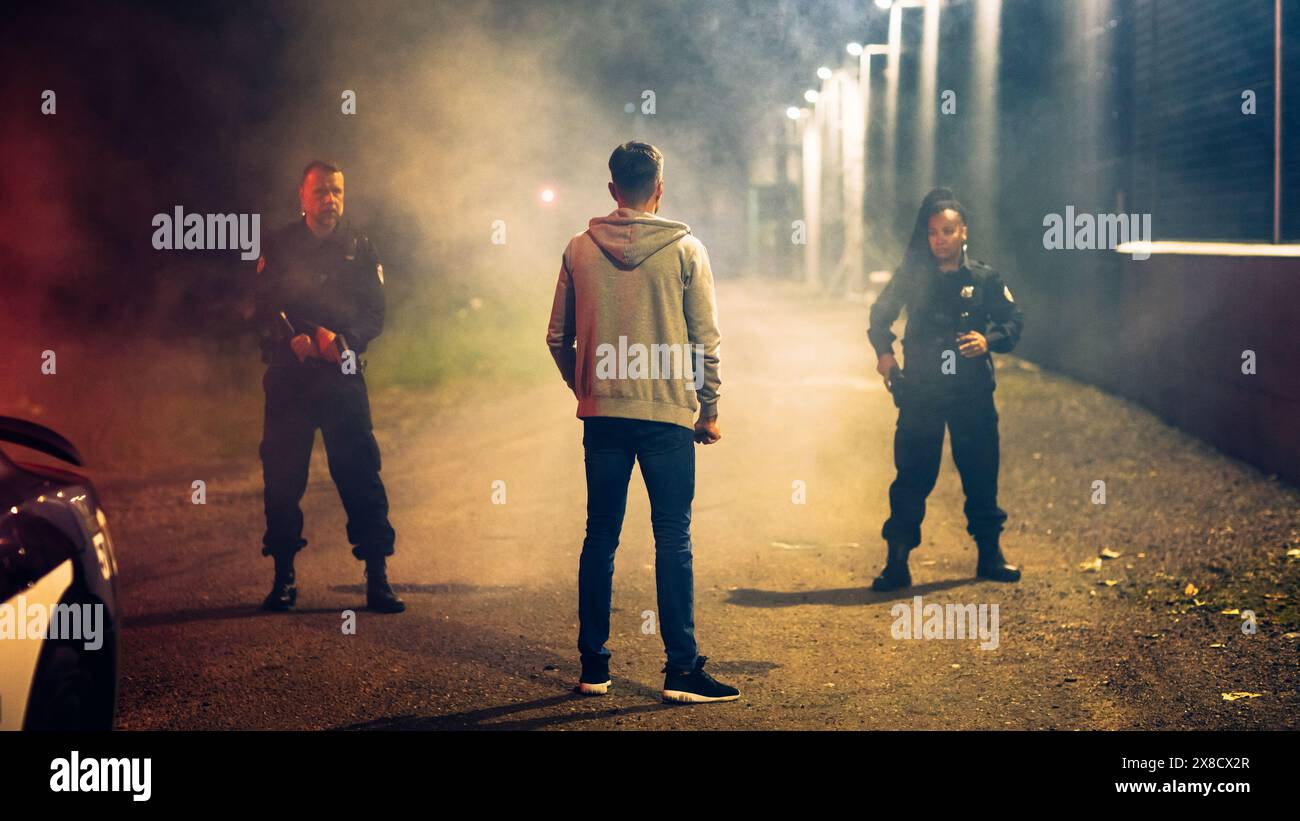 Two Police Officers Catch and Arrest Suspect. Heroic Officers of the ...
