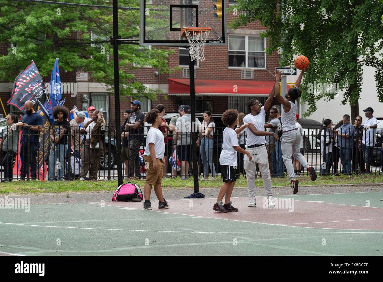 Bronx, United States. 23rd May, 2024. A group of kids play basketball ...