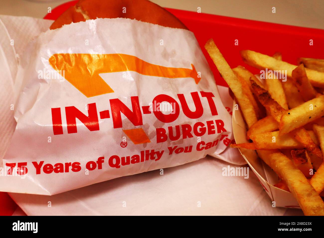 IN-N-OUT Burger, Hamburger and French Fries in a tray on the table ...