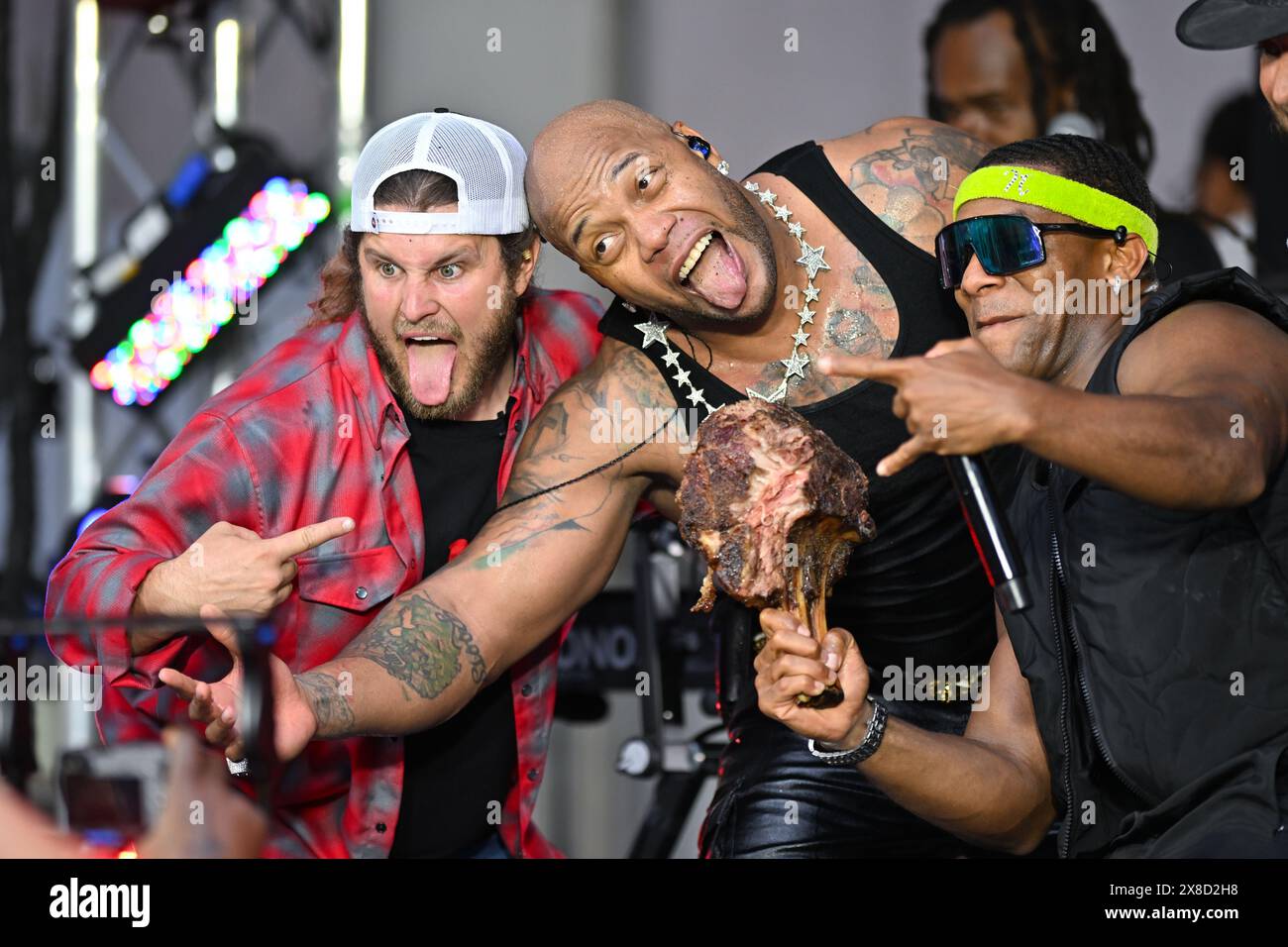 Flo Rida (center) performs on the Fox and Friends All American Concert ...