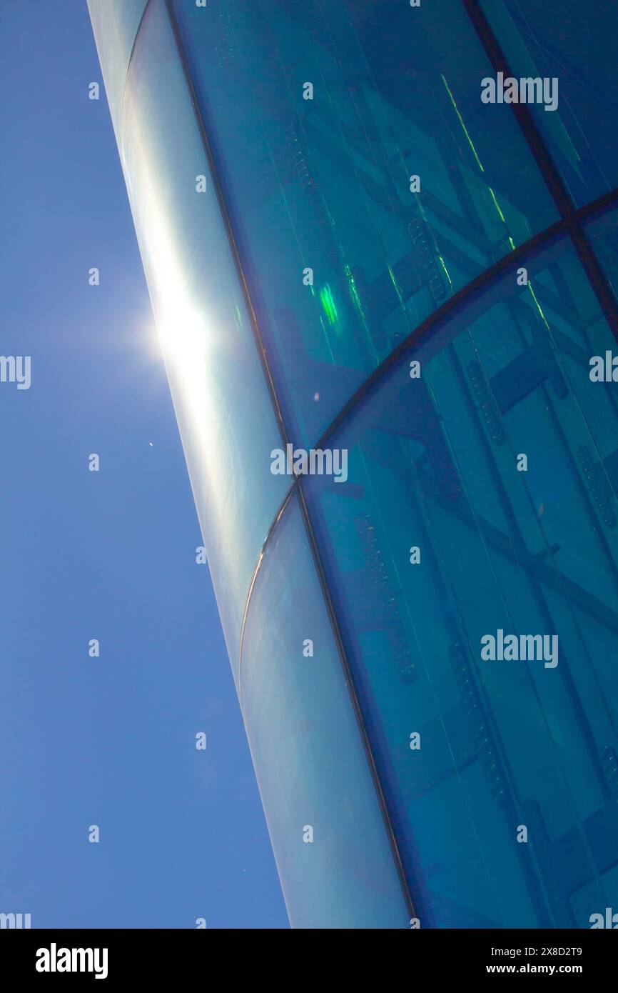 Glass and steel - mirrored facade of modern office building with ...