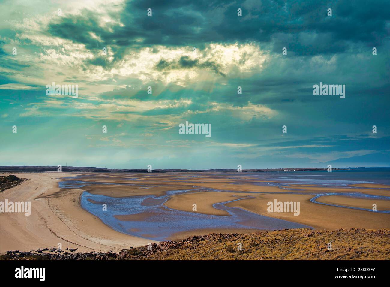 Tidal flats with natural channels near Cossack, in the Pilbara region ...