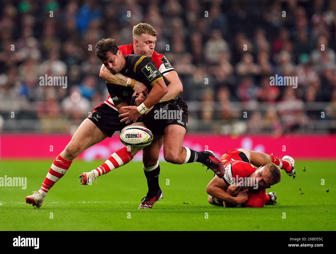 Hollywoodbet Sharks' Francois Venter is tackled by Gloucester Rugby's ...