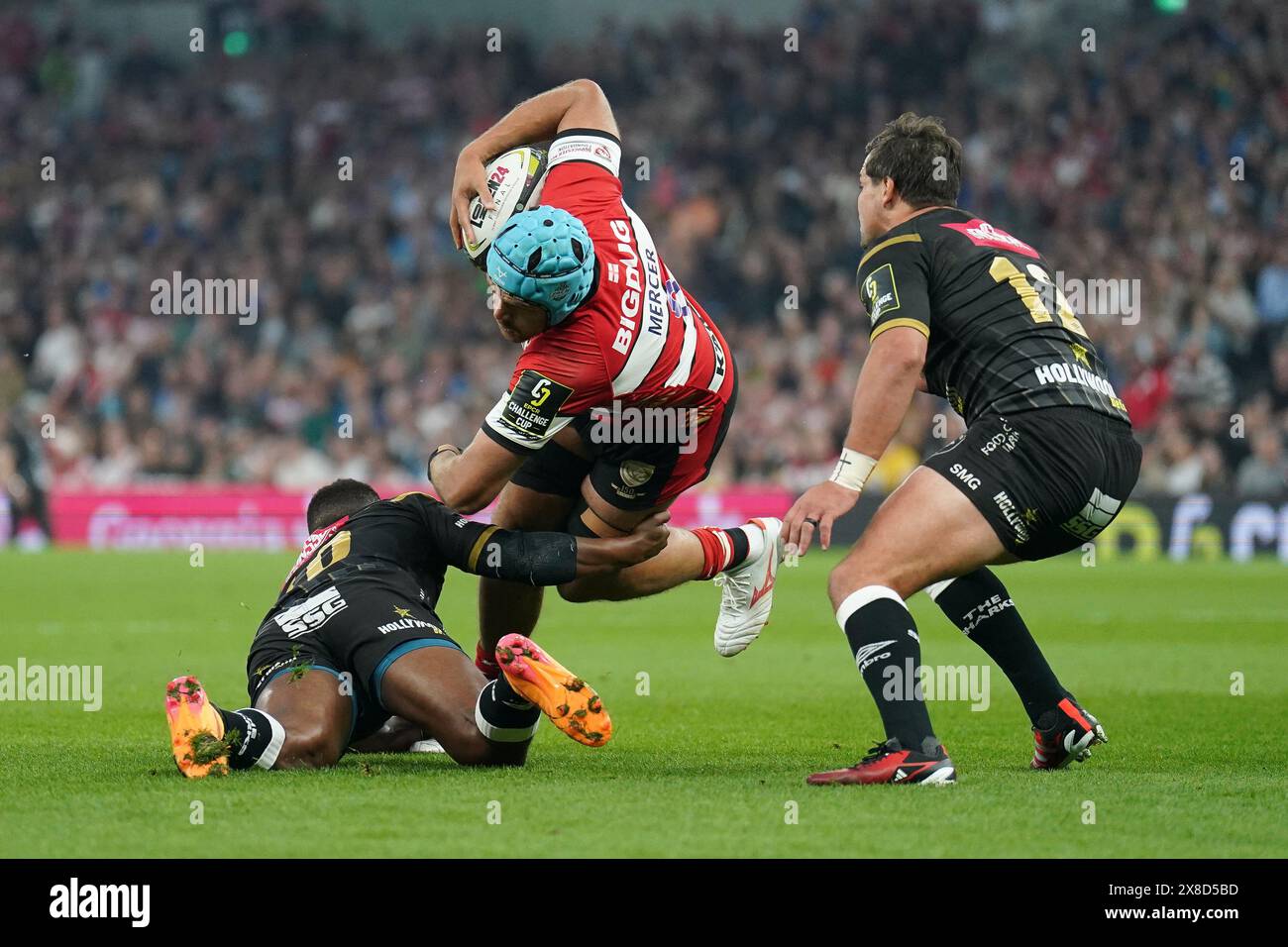 Gloucester Rugby's Zach Mercer is tackled by Hollywoodbet Sharks' Siya ...