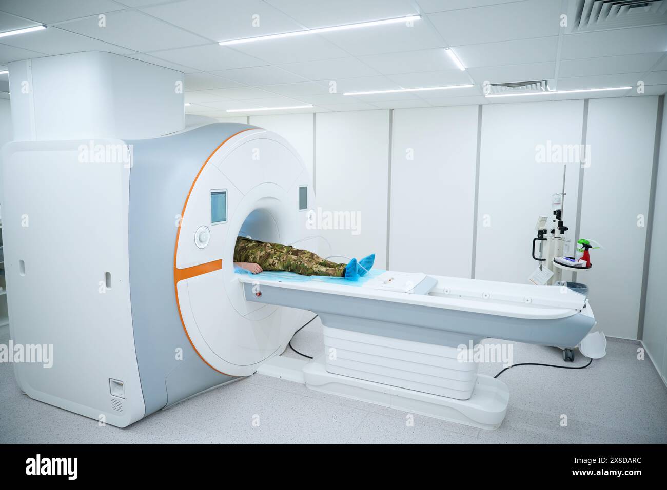 Military patient undergoing brain magnetic resonance imaging procedure ...