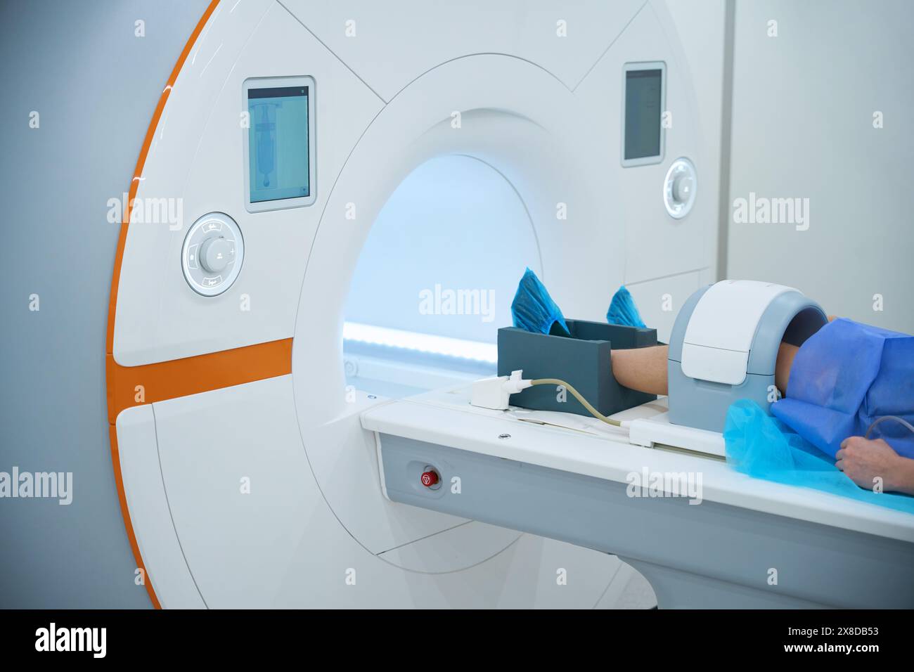 Patient prepared for MRI of lower extremity joint Stock Photo - Alamy