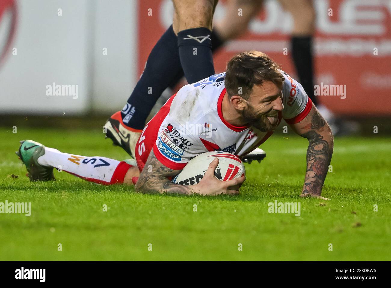 Daryl Clark of St. Helens goes over for a try during the Betfred Super ...