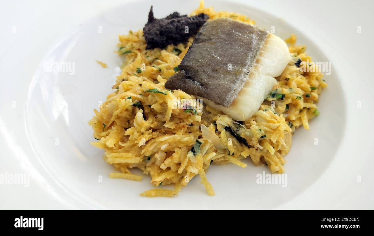 Bacalhau a Bras, roasted rehydrated salted cod with a garnish of ...