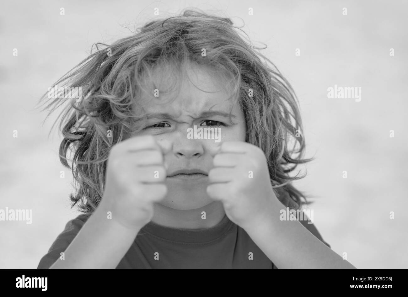 Child temper with angry expression. Angry hateful little anger boy ...