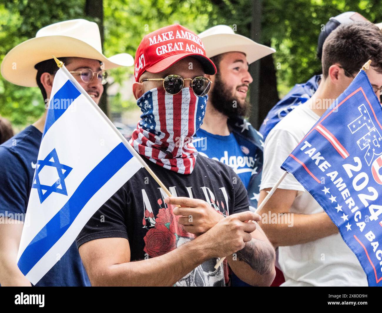 New York, New York, USA. 23rd May, 2024. A man on line masked with an ...