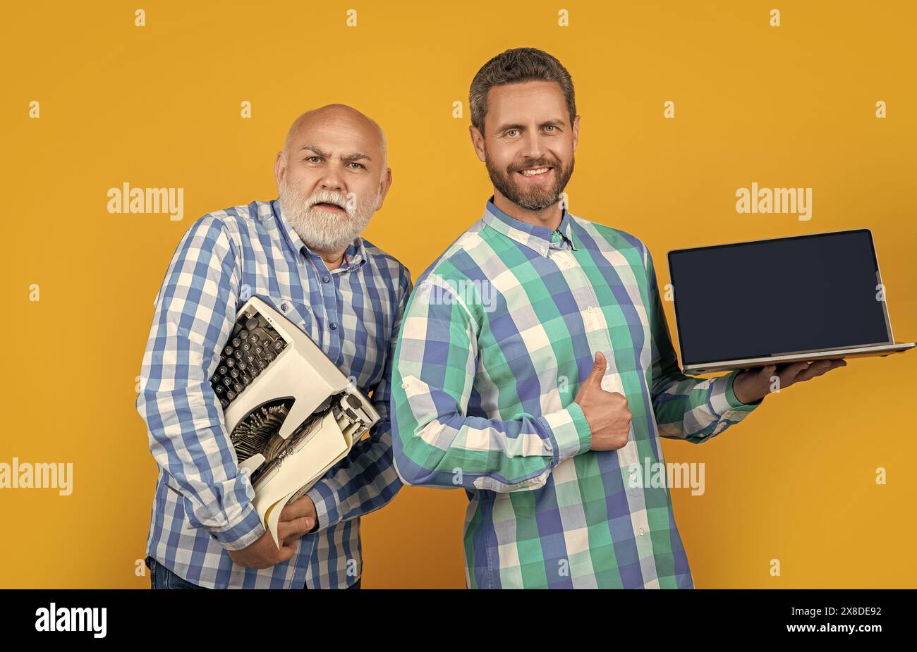 photo of writer show vs contrast with laptop and retro typewriter ...