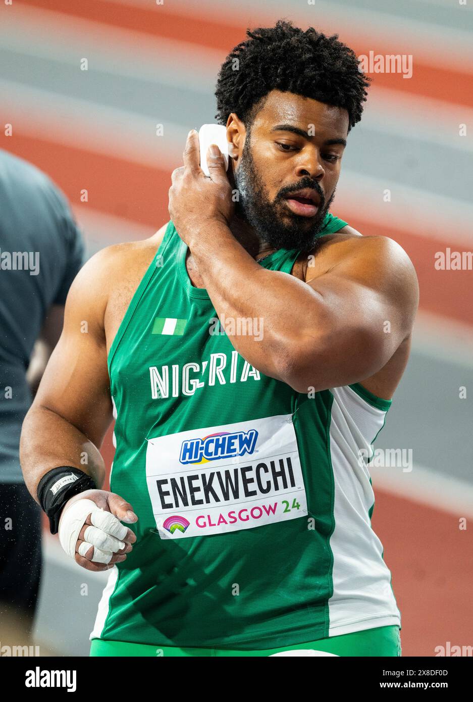 competing in the men’s shot put at the World Athletics Indoor ...