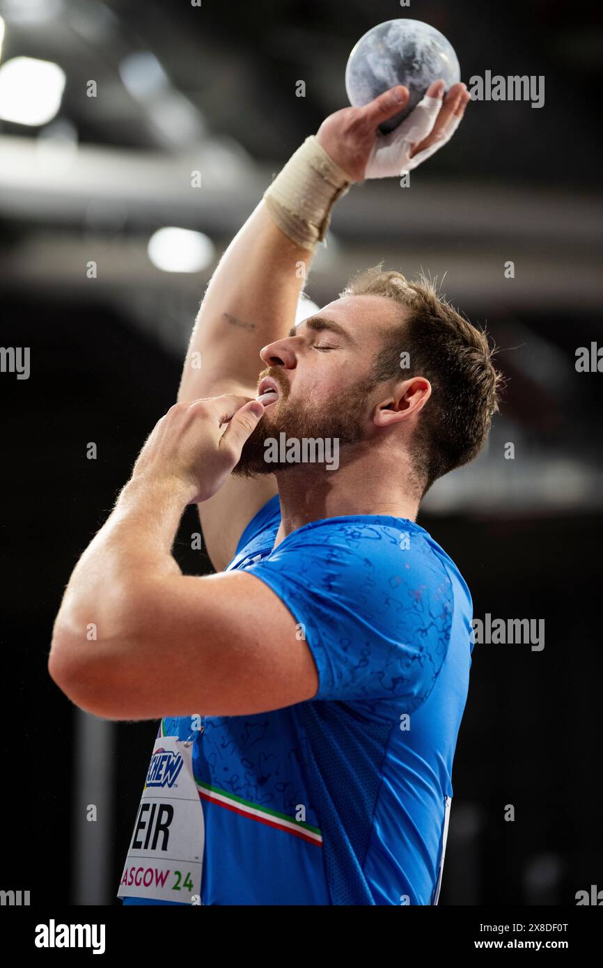 competing in the men’s shot put at the World Athletics Indoor ...