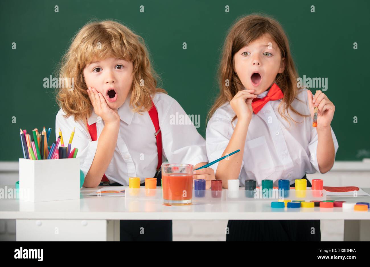 Cute school surprised friends kids drawing and painting at school ...