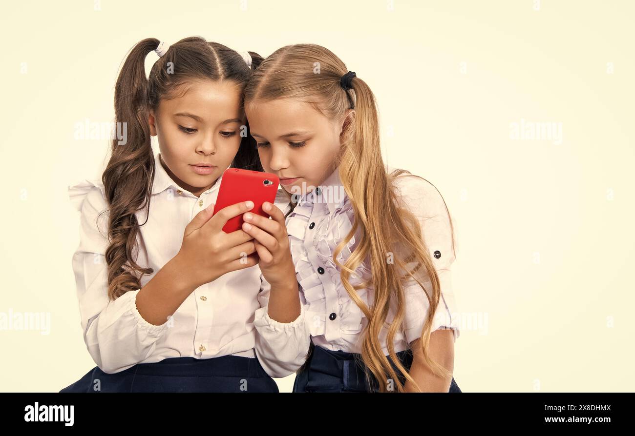 girls children engaged in lively conversations. messaging school girls ...
