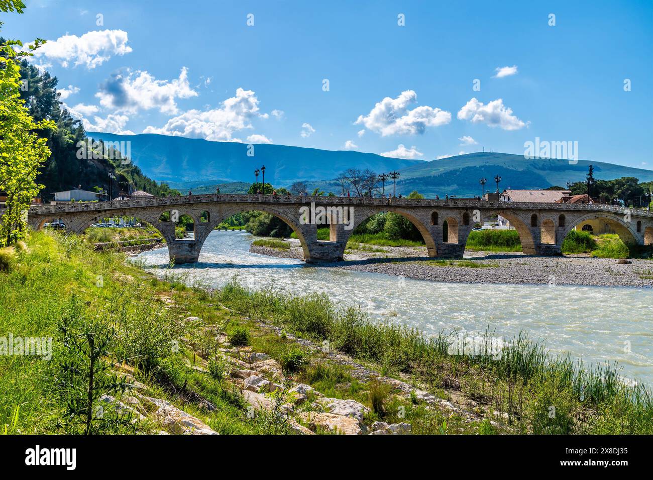 A view over the River Osum along the Gorica bridge in Berat, Albania in ...