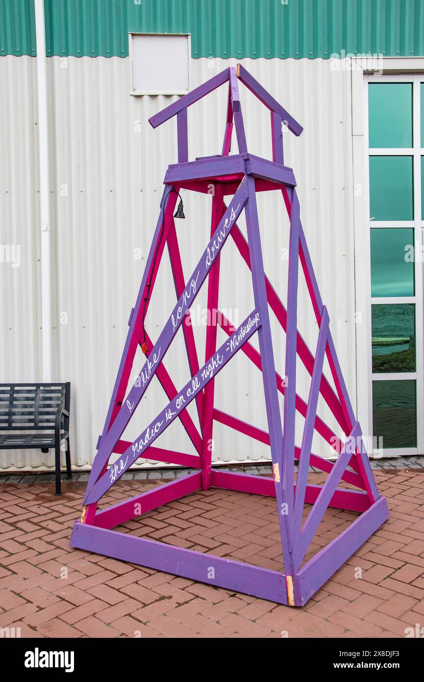Decorative purple lighthouse structure with messages at the wharf in ...