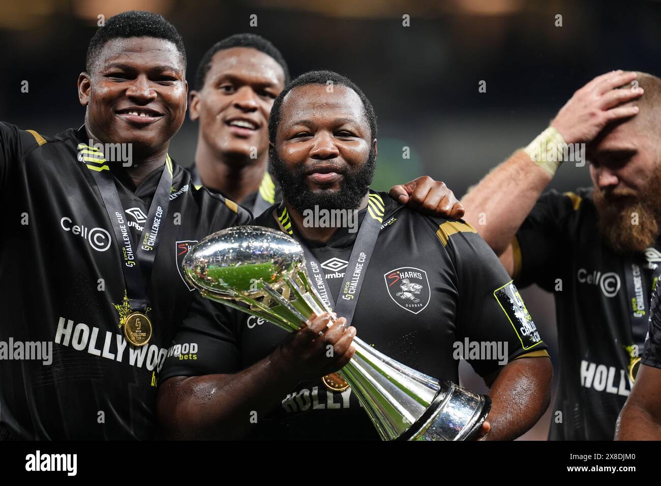 Hollywoodbet Sharks Ox Nche celebrates with the trophy after winning ...