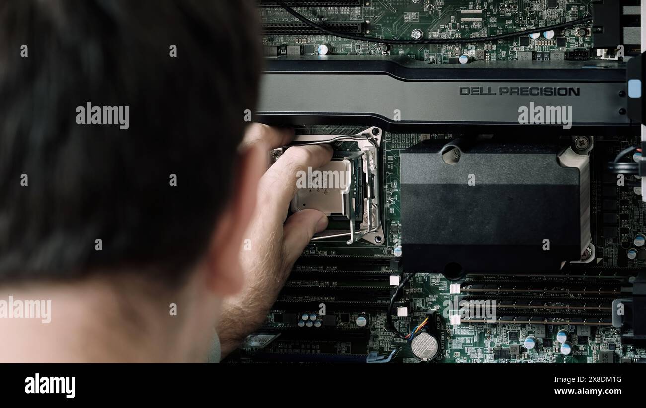 London, UK - Aug 27, 2022: A technician finalizes the installation of ...