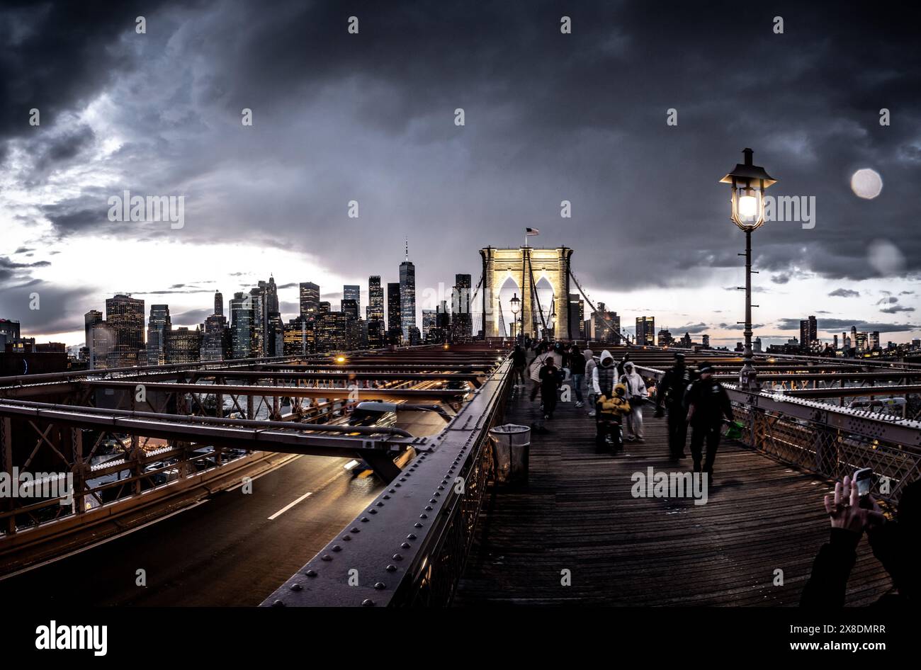 Majestic Brooklyn Bridge graces the NYC skyline. Soaring steel arches ...