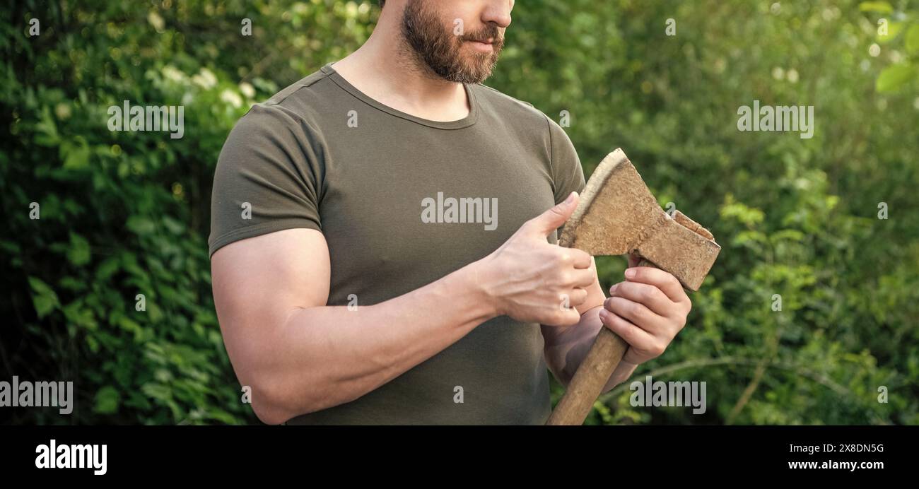 man with ax outdoor. cropped photo of man with ax. man with ax. man ...