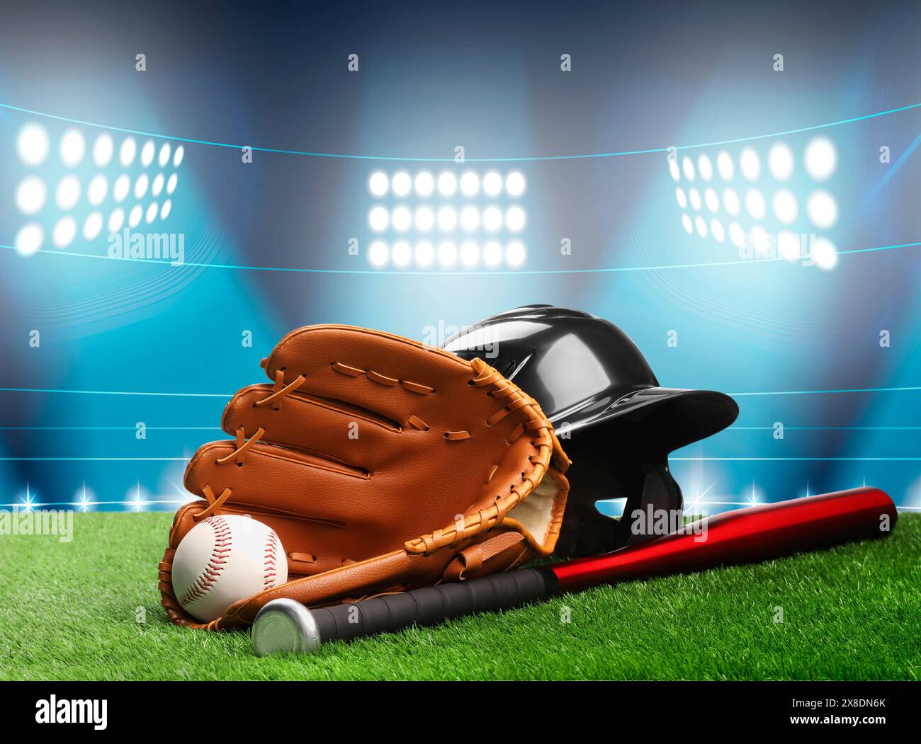 Baseball bat, glove, helmet and ball on grass at stadium Stock Photo ...