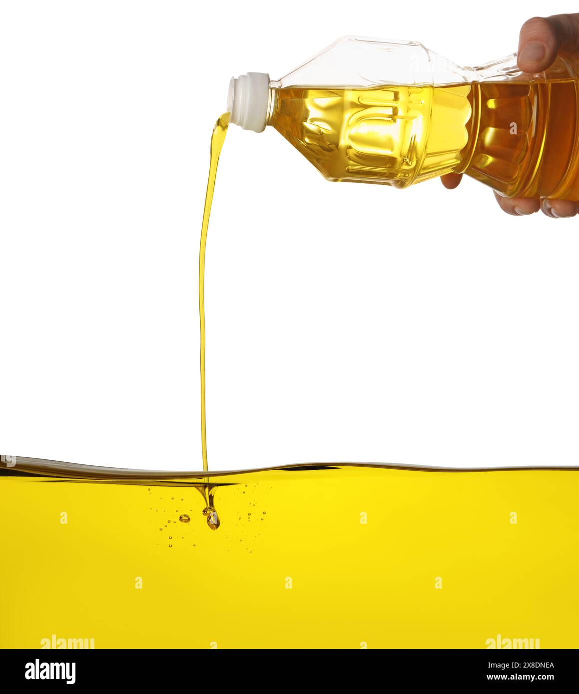 Man pouring oil from bottle hi-res stock photography and images - Alamy