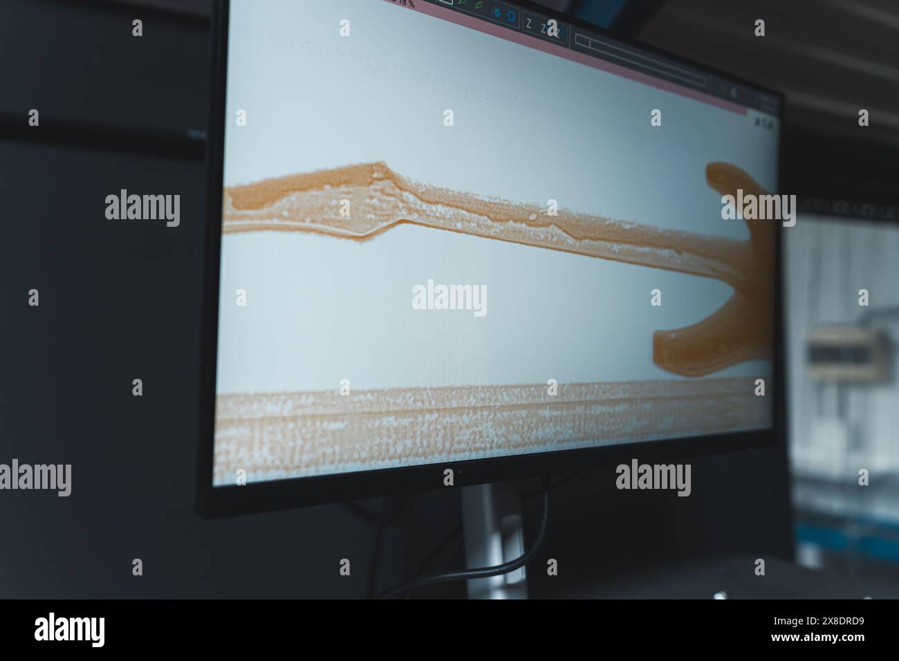 x ray of the guitar on the computer screen, testing the quality of ...