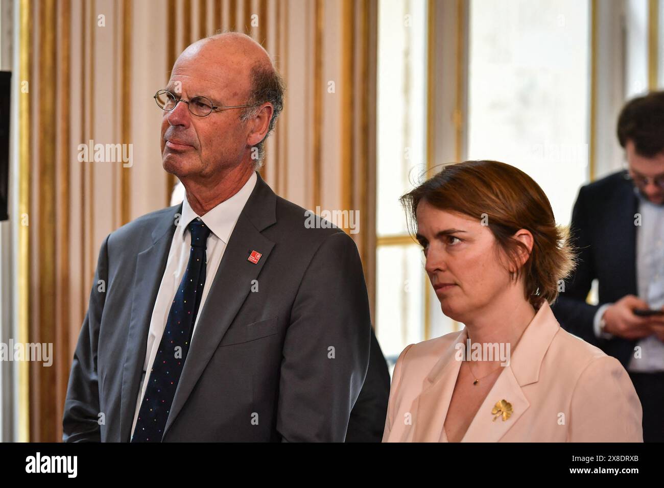 Chief Executive Officer of Caisse des Depots Eric Lombard (L) looks on ...
