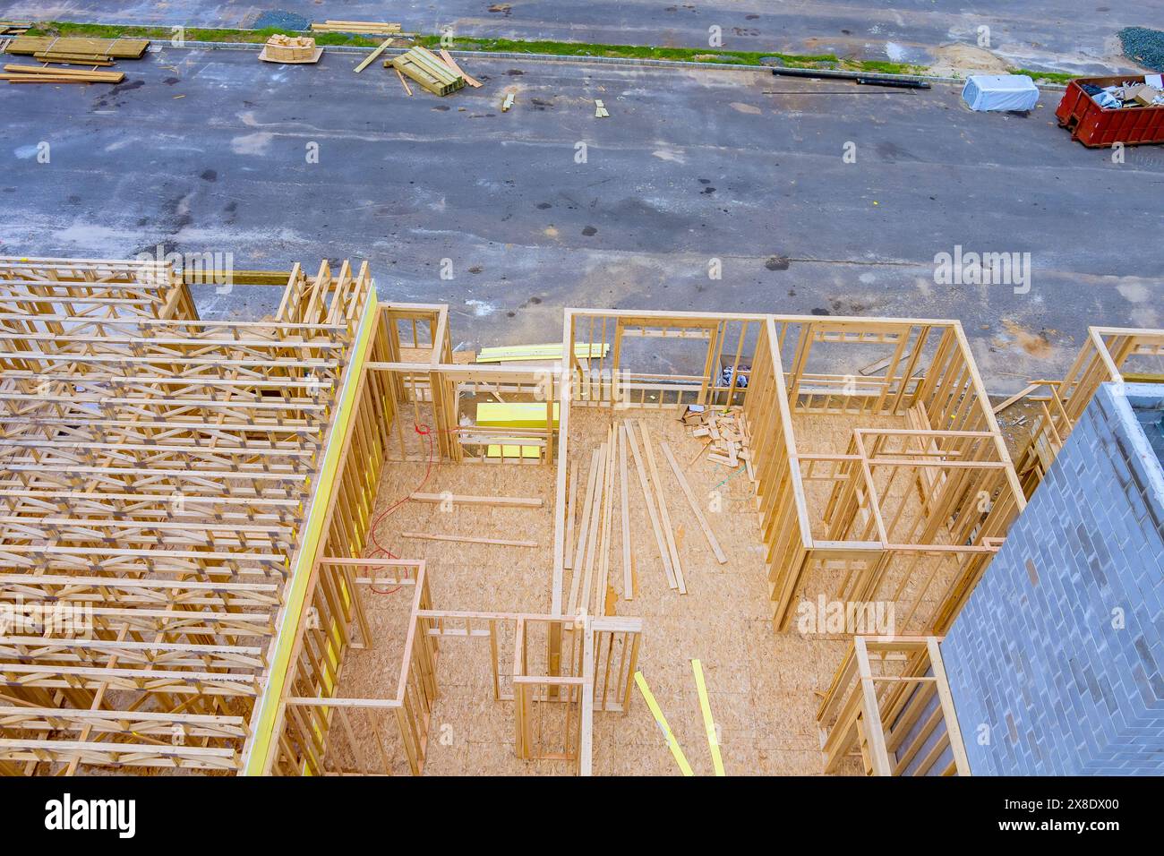 In residential construction project, unfinished wood frames are used ...