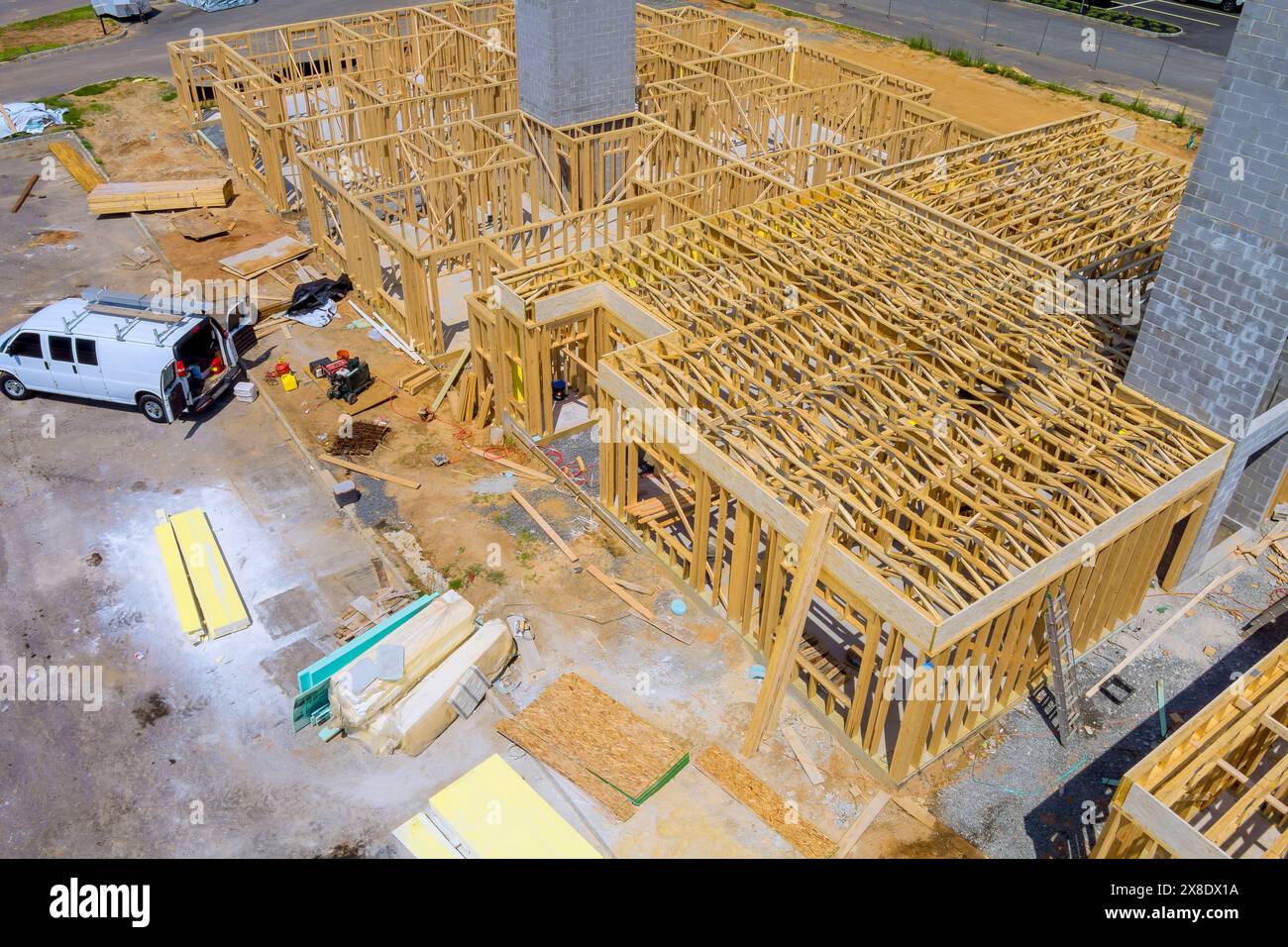 In construction of new home, unfinished frames wooden beams are used as ...