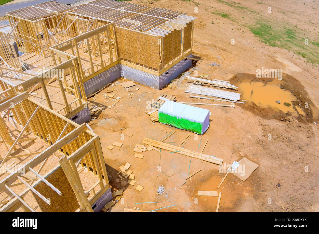 During construction of new residence, unfinished structures are used as ...