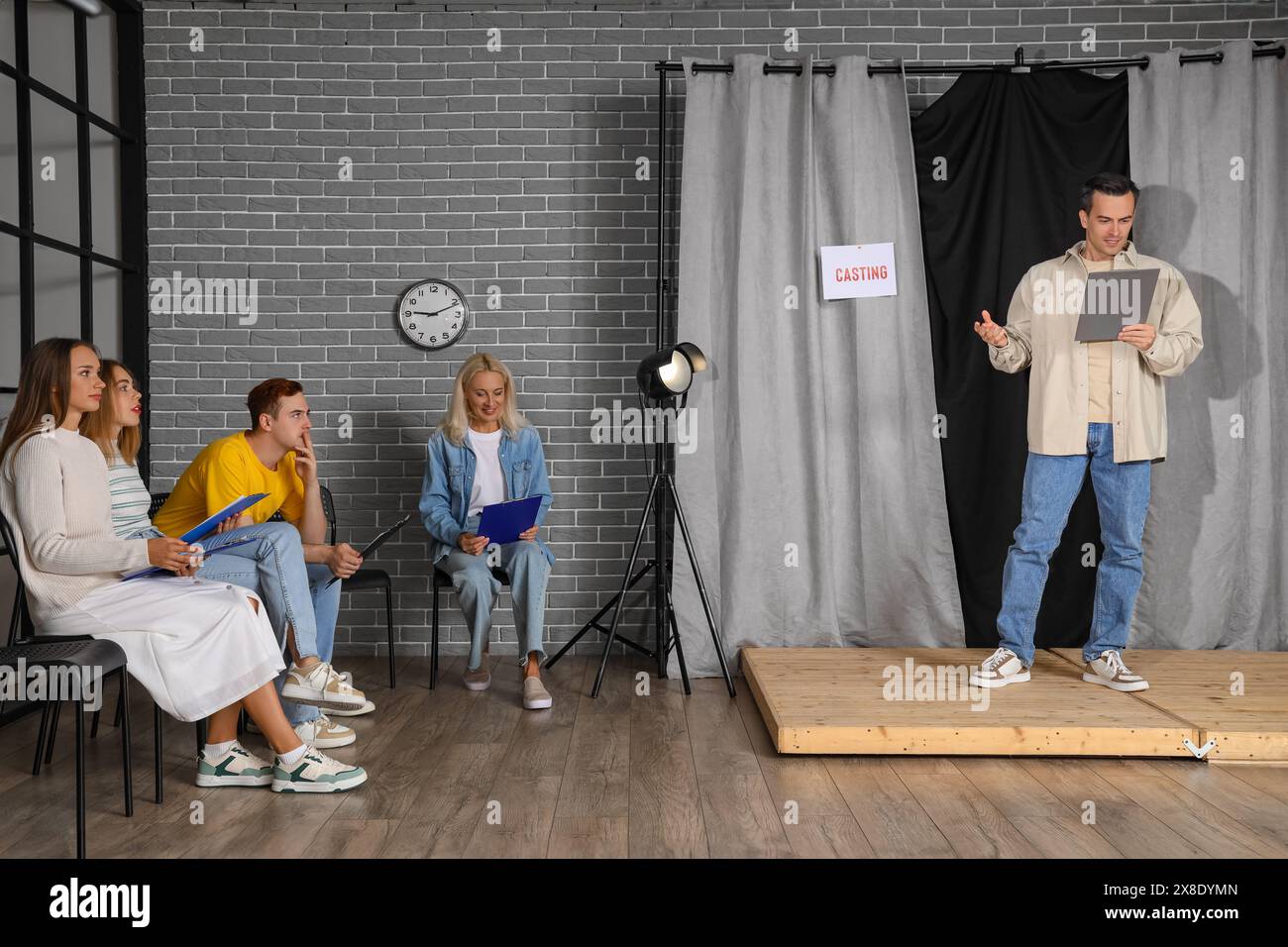 Actors casting on stage in audition room Stock Photo - Alamy