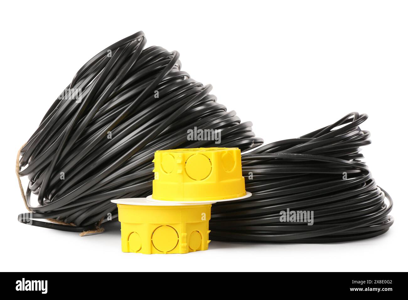 Rolled cables and electrical junction boxes on white background Stock ...