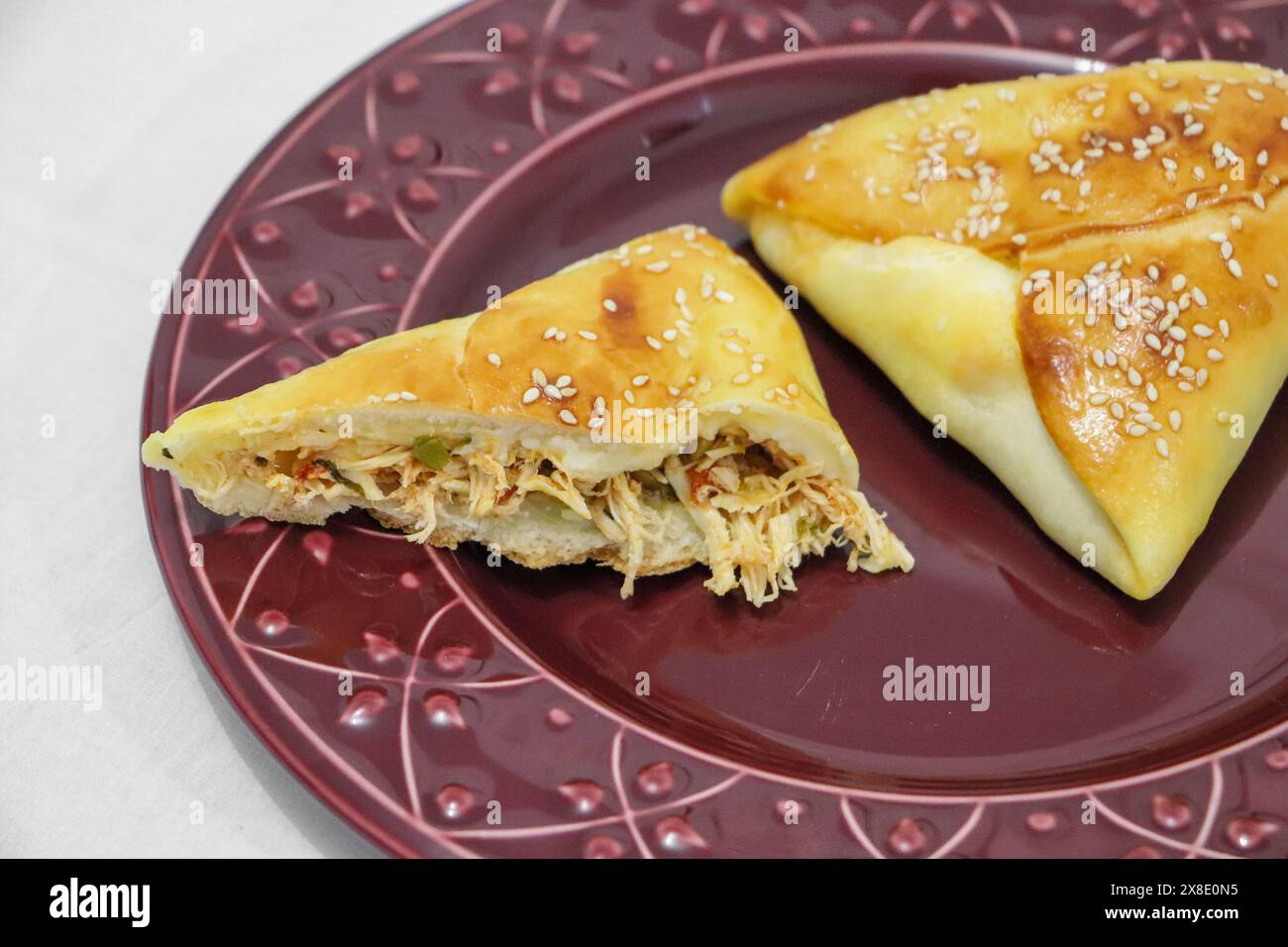 chicken fillet cut in half Stock Photo - Alamy