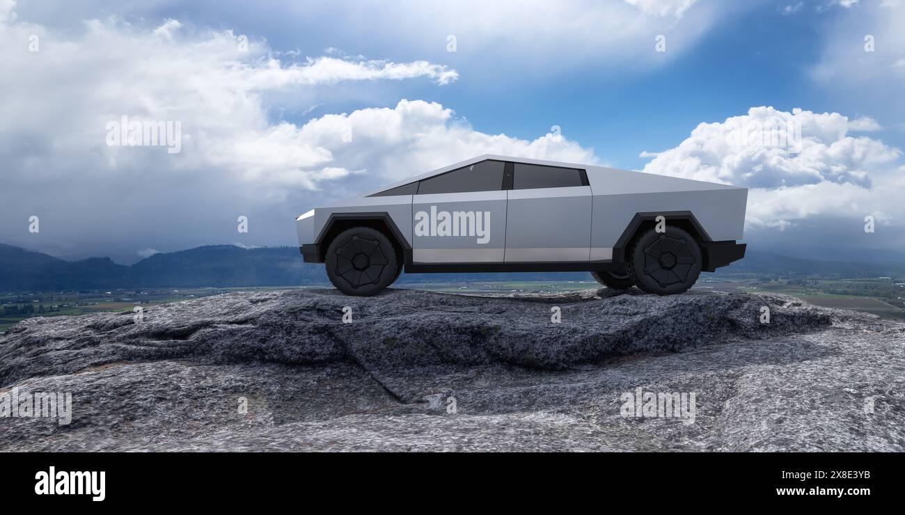Tesla Cybertruck on a Rocky Mountain Top. Aerial landscape in ...