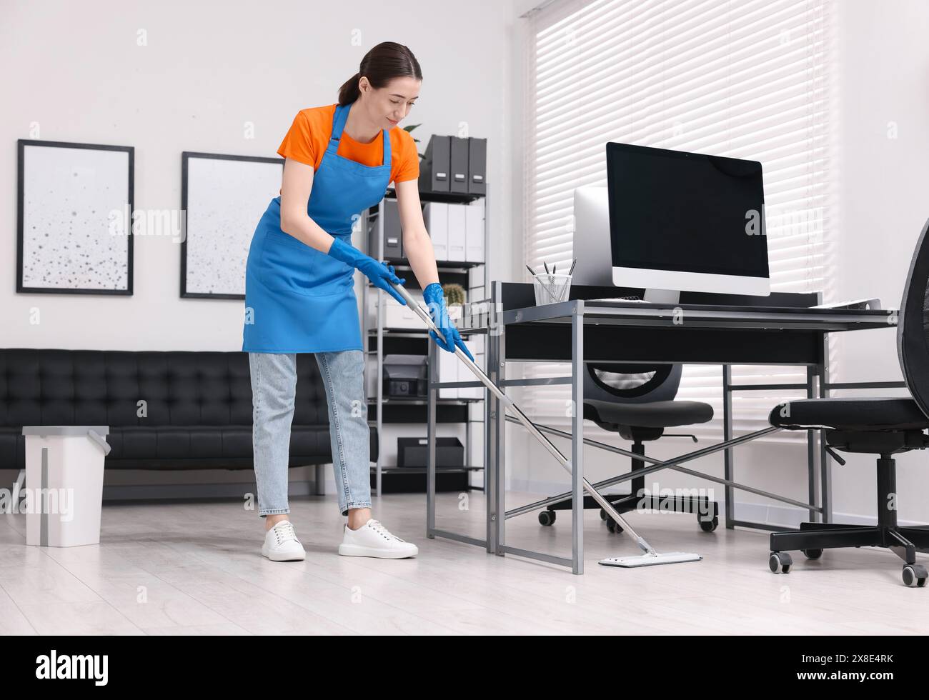 Woman cleaning screen computer hi-res stock photography and images - Alamy
