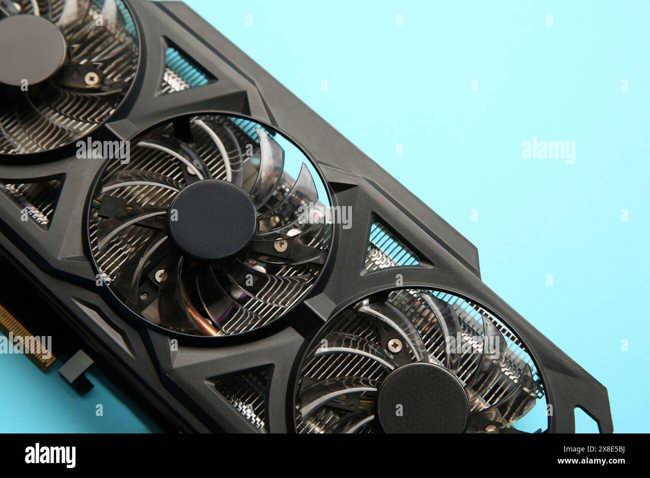 One graphics card on light blue background Stock Photo - Alamy