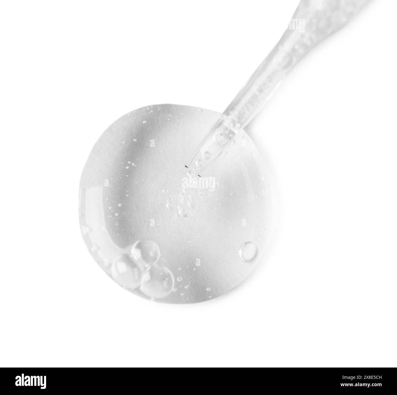 Glass pipette and transparent liquid isolated on white, top view Stock ...