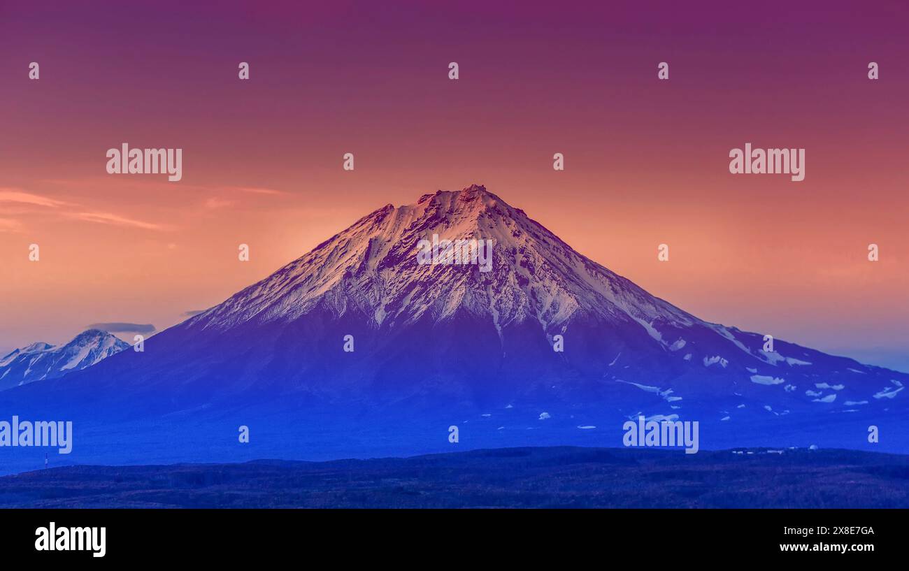 The Avachinsky volcano in Kamchatka in the evening in sunset Stock ...