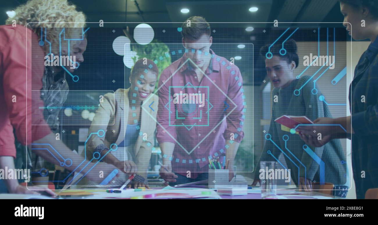Image of microprocessor connections over diverse colleagues discussing ...